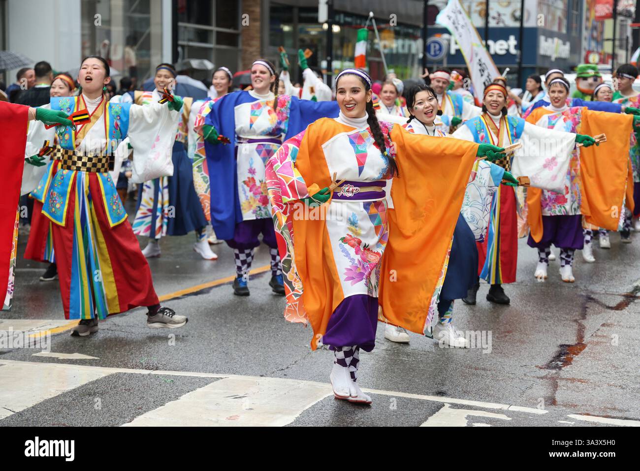 A team performs the marching Japanese dance. Toronto, Canada.16th March ...