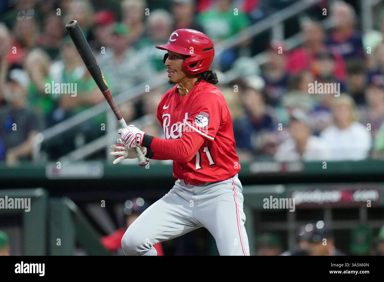 Cincinnati Reds' Edwin Arroyo follows through with his swing against ...