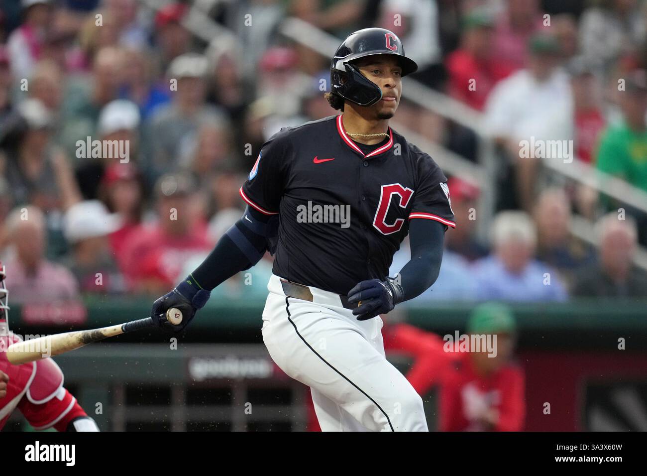 Cleveland Guardians' Bo Naylor follows through with his swing against ...