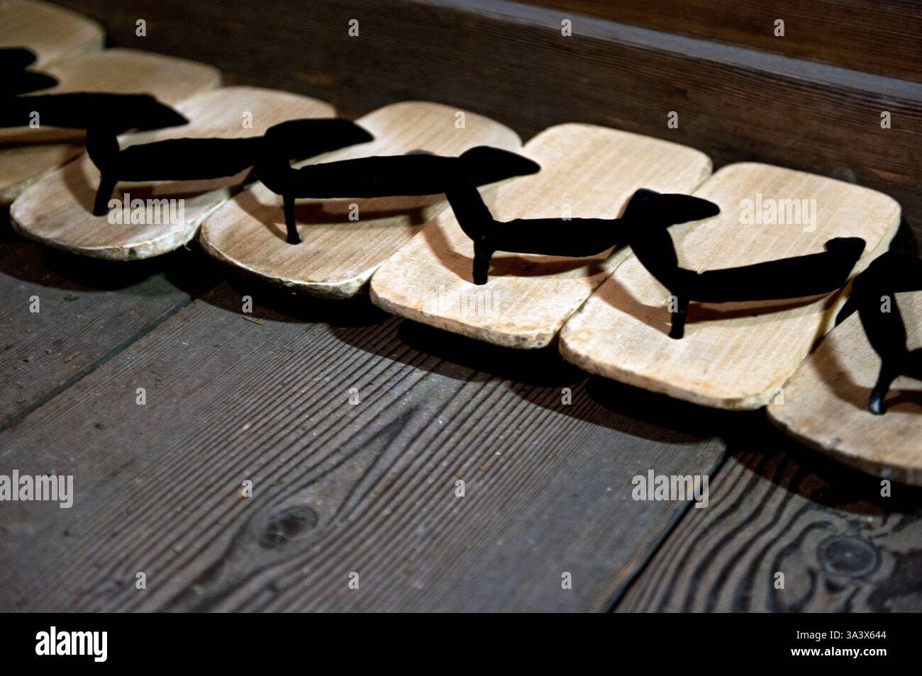 Traditional wooden geta sandals removed before entering a temple is a ...