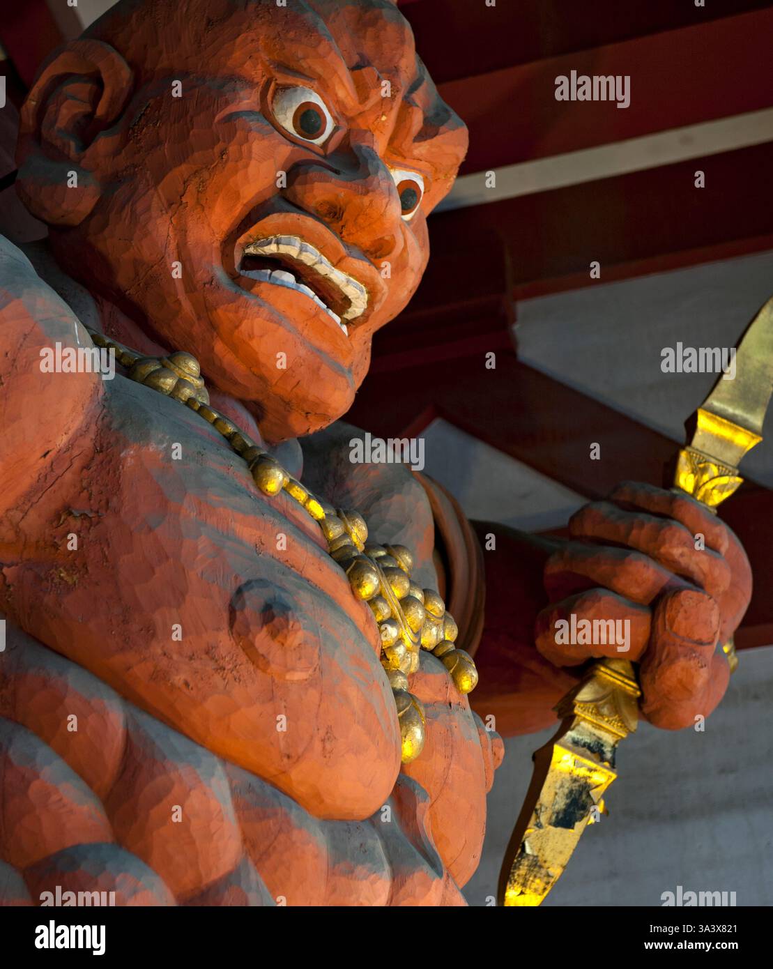 Fierce expression of gate guardian statue with open mouth at Shitennoji ...