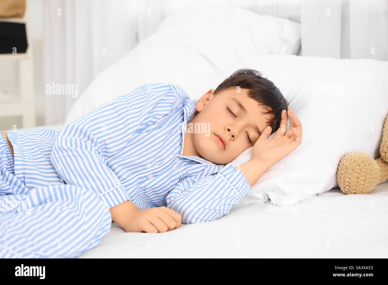 Cute little boy sleeping in bedroom Stock Photo - Alamy
