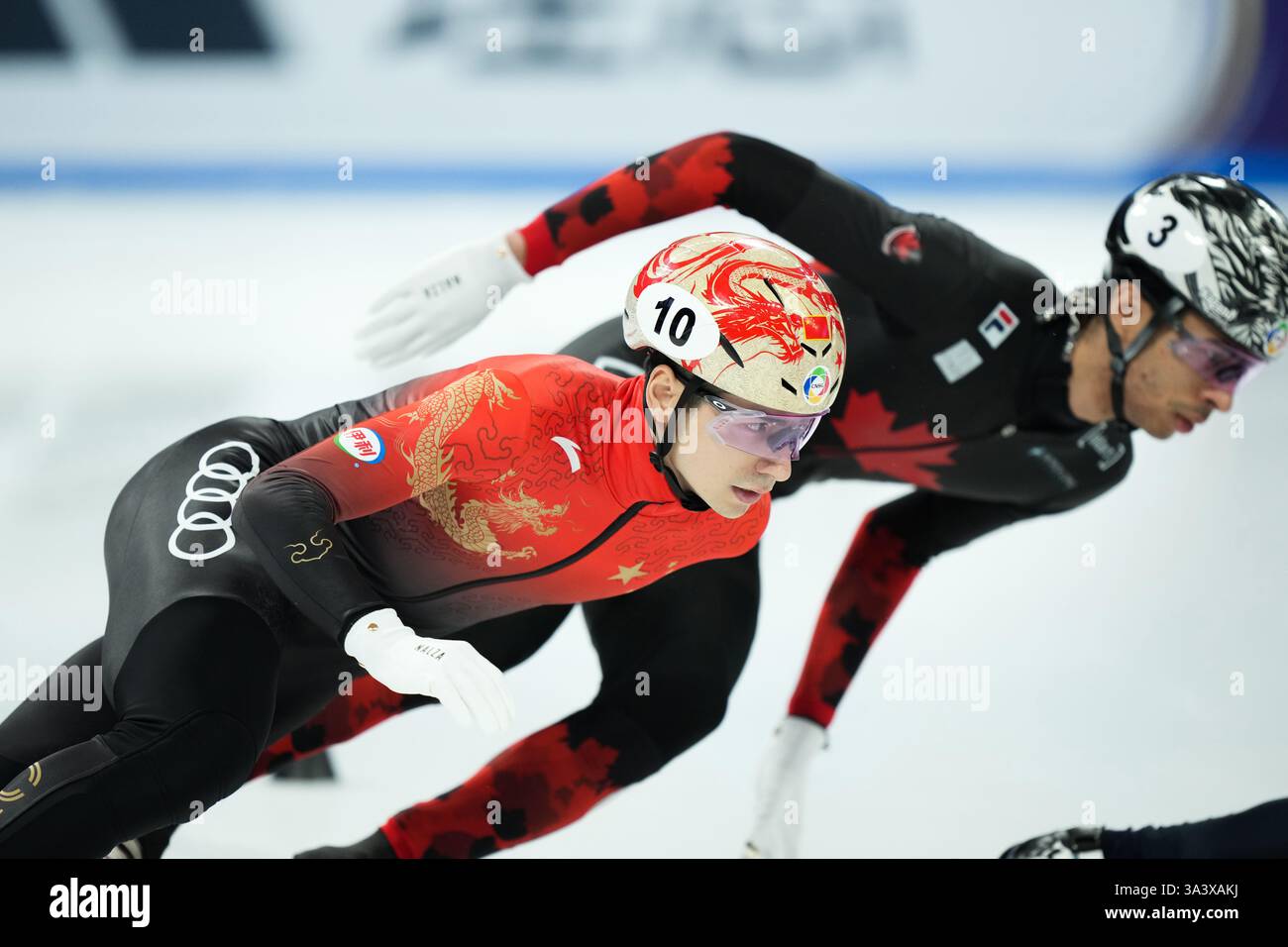 Chinese skater Liu Shaoang (left) competes during the men’s 1,500m at ...