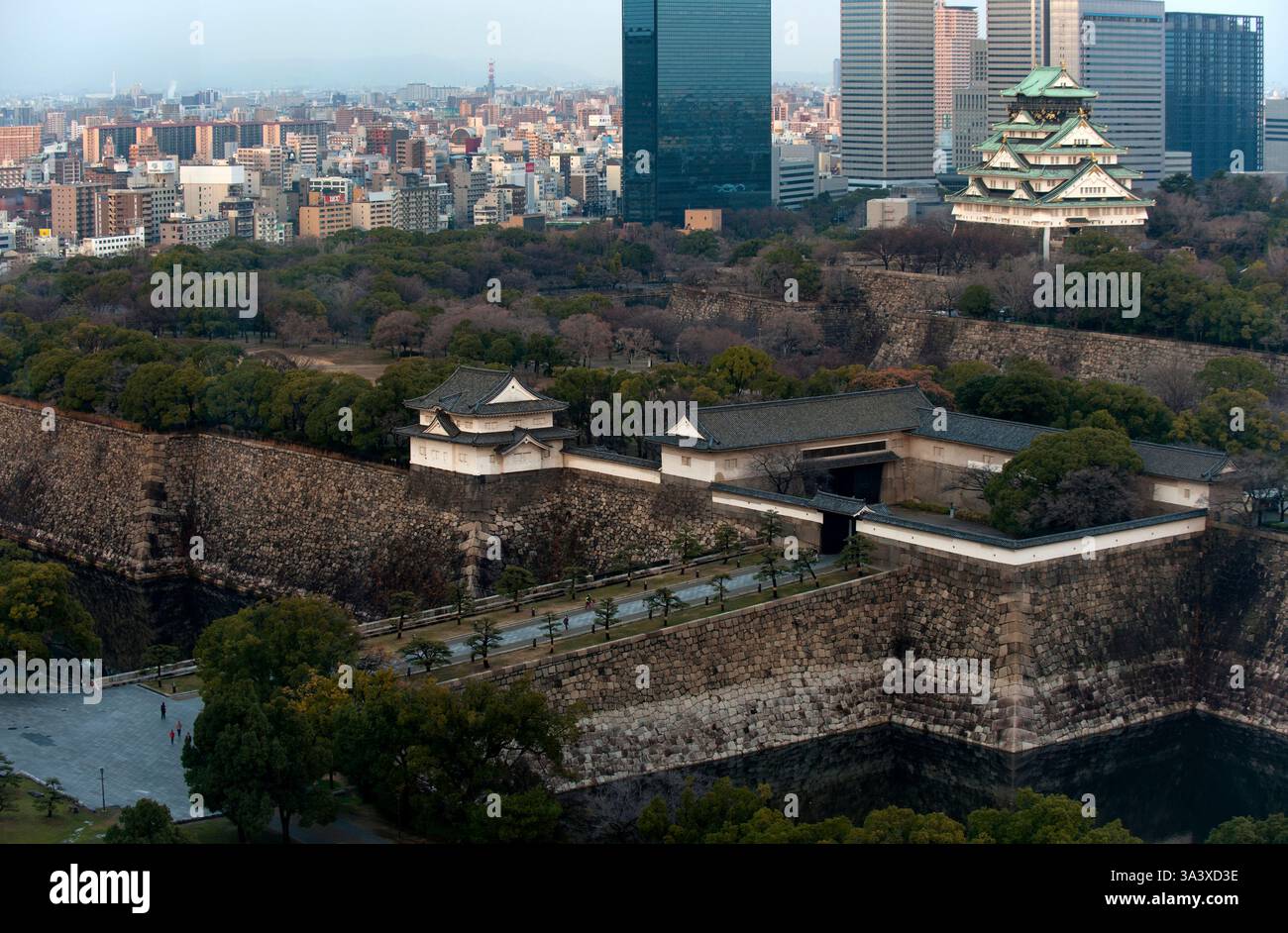 Aerial view of Osaka Castle and Otemon Gate with high-rise buildings of ...