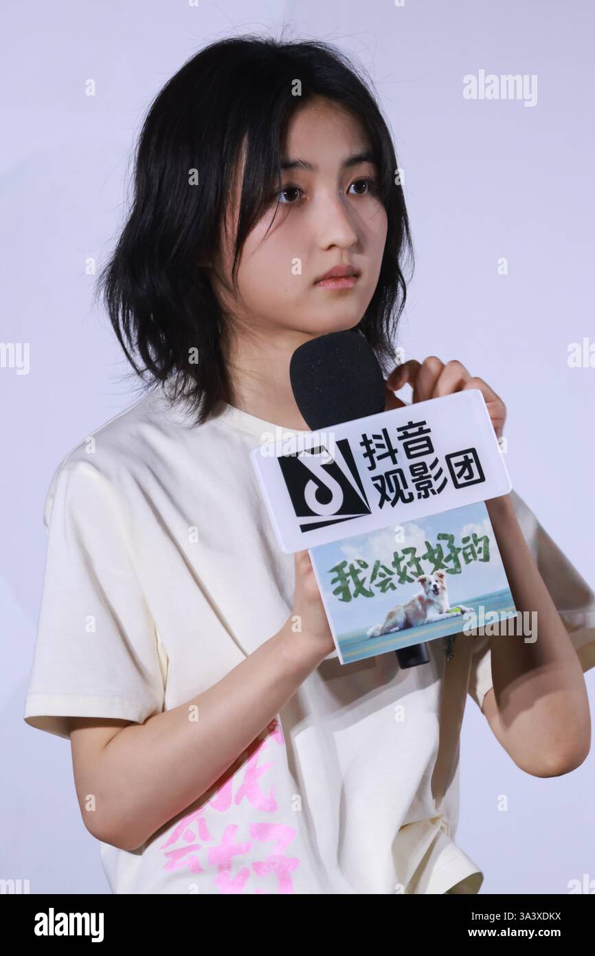 Chinese actress Zhang Zifeng attends an activity in Beijing, China, 15 March, 2025 Stock Photo ...