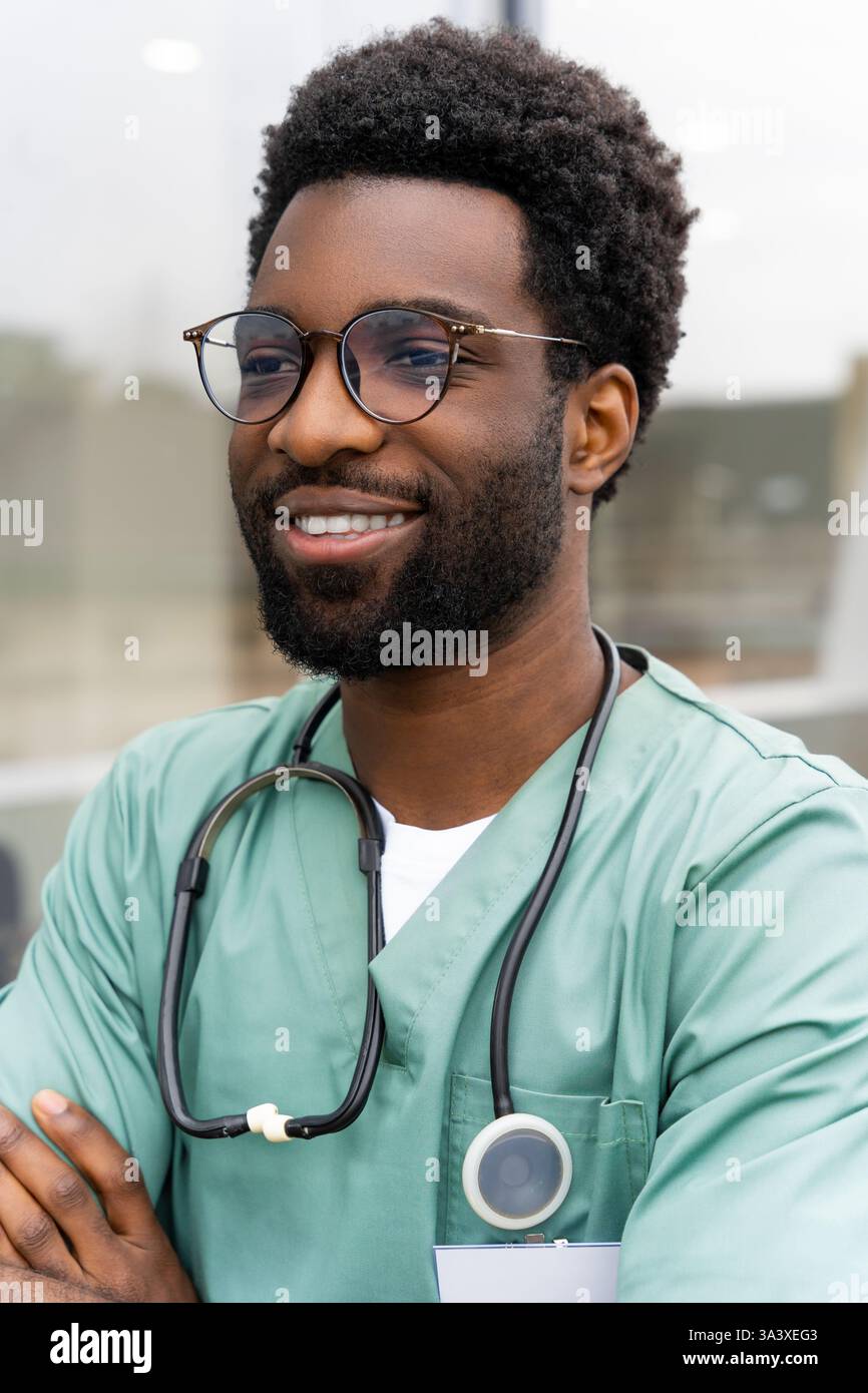 African American doctor wearing uniform standing in hospital office ...