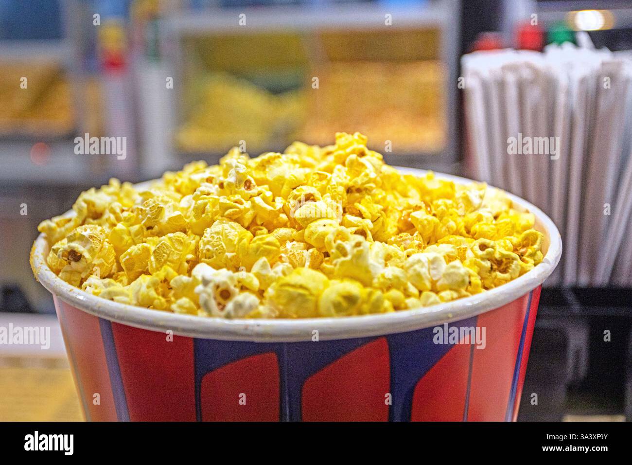 eating popcorn in the cinema before watching a movie. family weekend ...