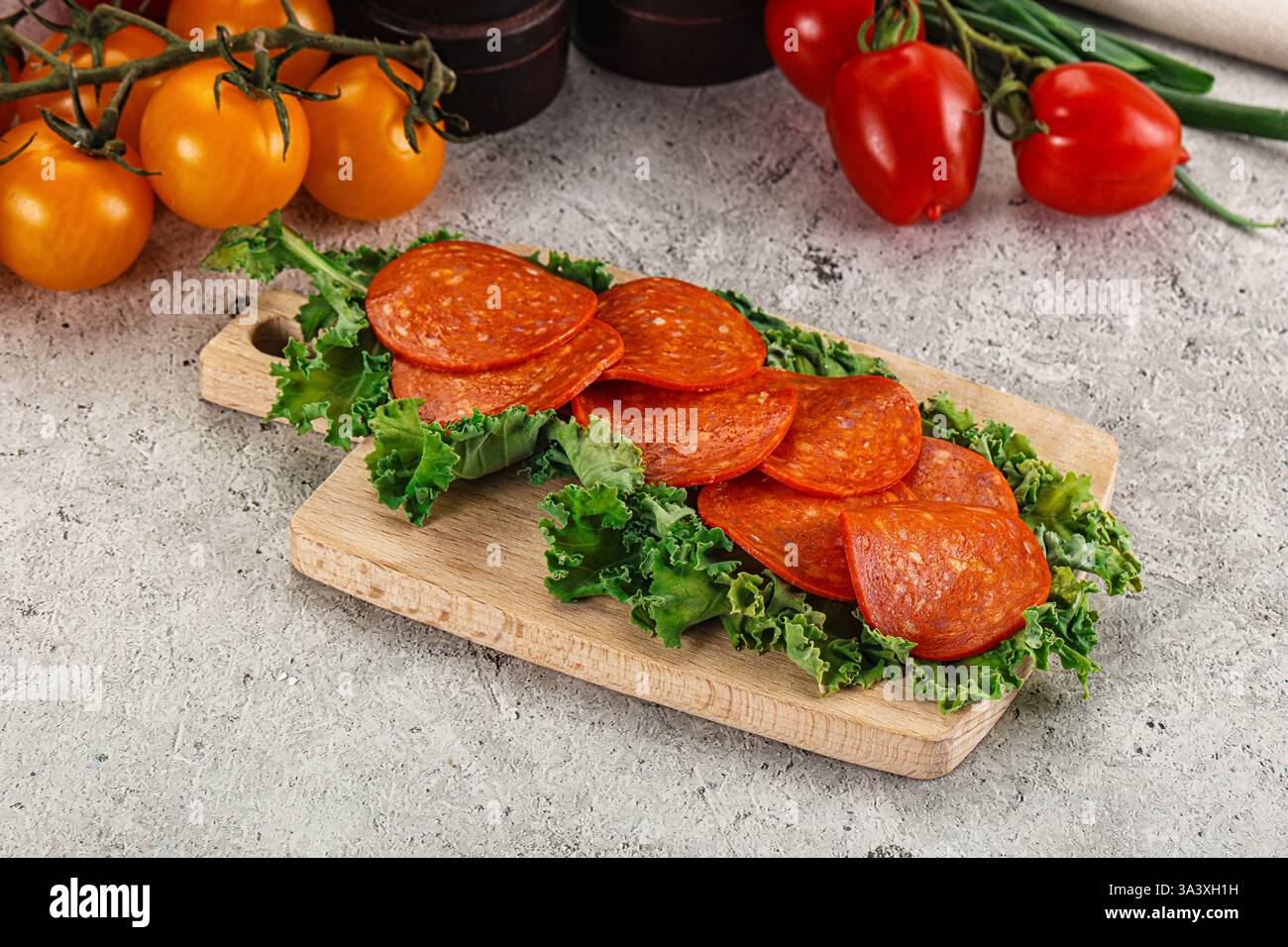 Spanish salami cured chorizo sausage slices Stock Photo - Alamy