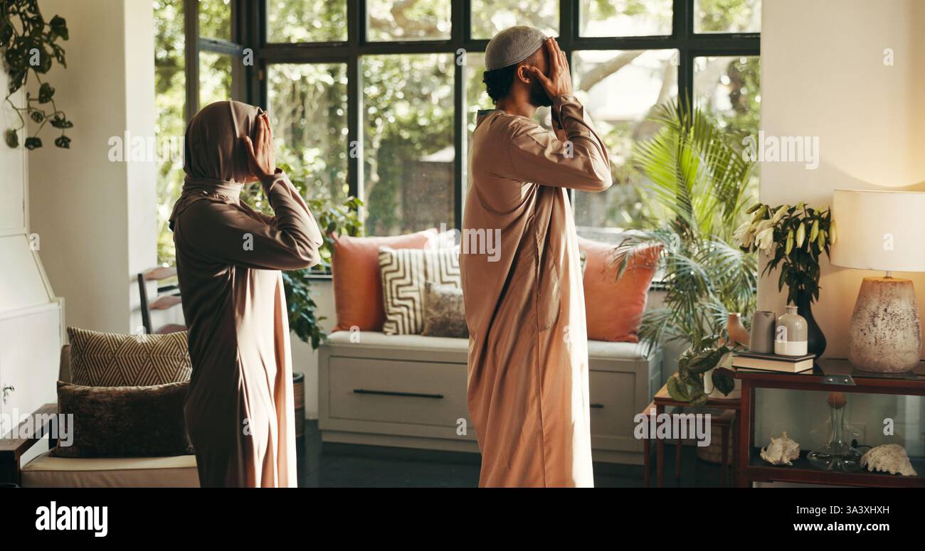 Muslim, couple and praying with dua at house of spiritual worship ...