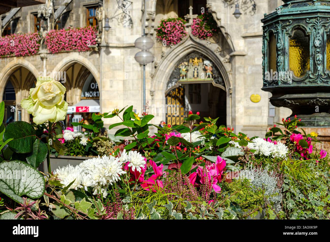 Flower decoration and lantern at the foot of the Marian column, in the ...