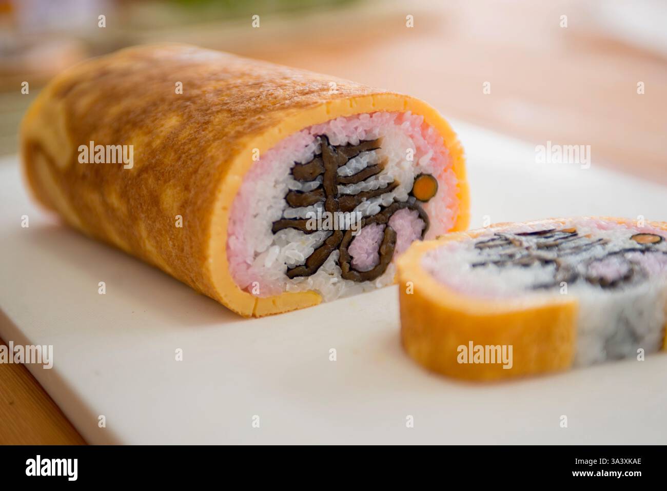 Photo shows futomaki matsuri sushi (thick festive rolls) that are ...