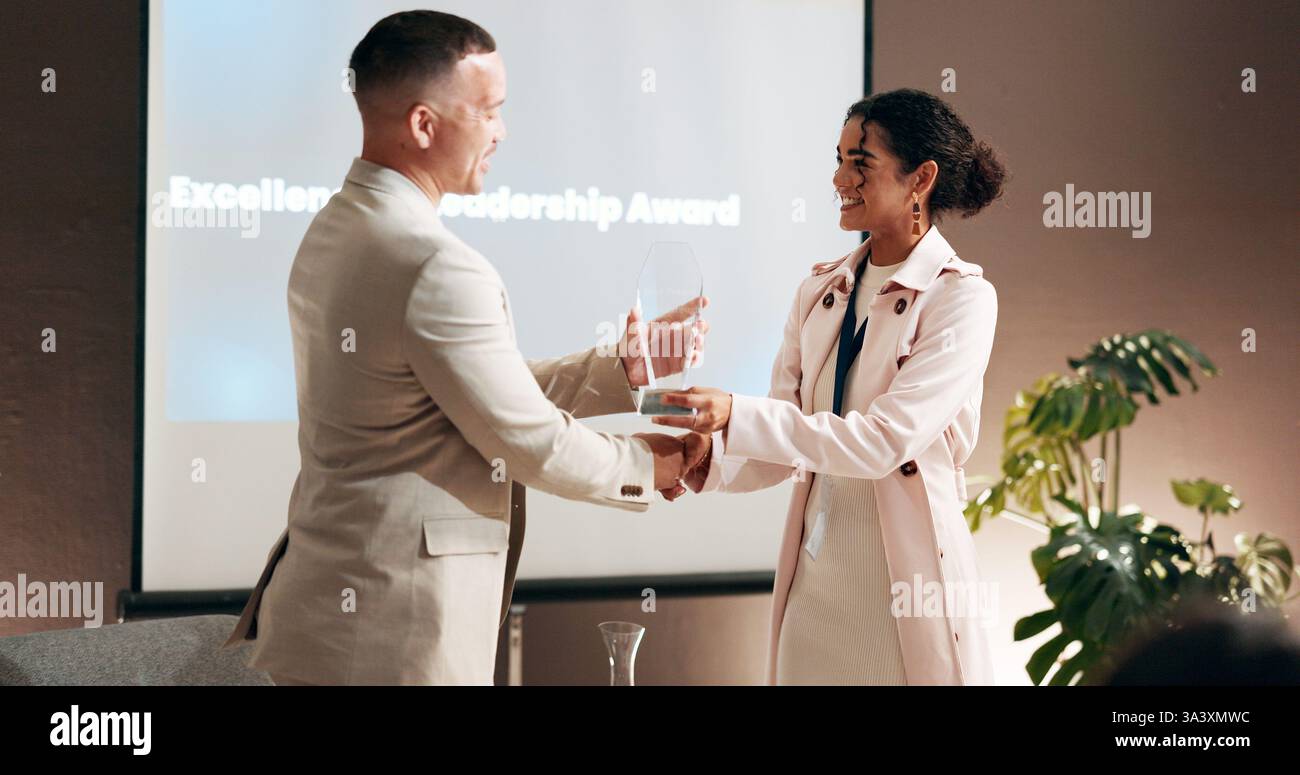 Trophy, presentation and success with business people at award ceremony ...