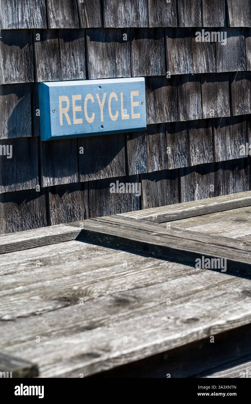 Waste disposal station stands in a urban park, traditional Cape Cod ...