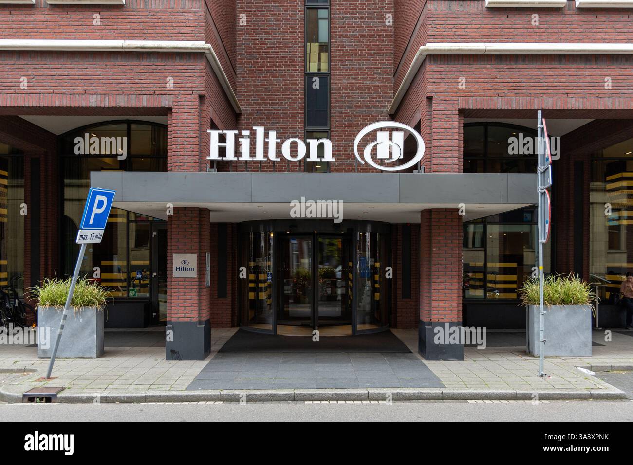 Hilton Hotel logo sign. Hilton is an international hotel and resort ...
