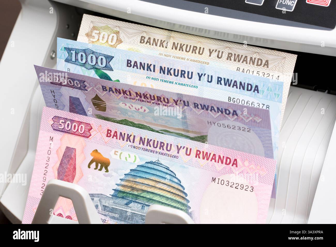 Rwandan money - Franc in the counting machine Stock Photo - Alamy