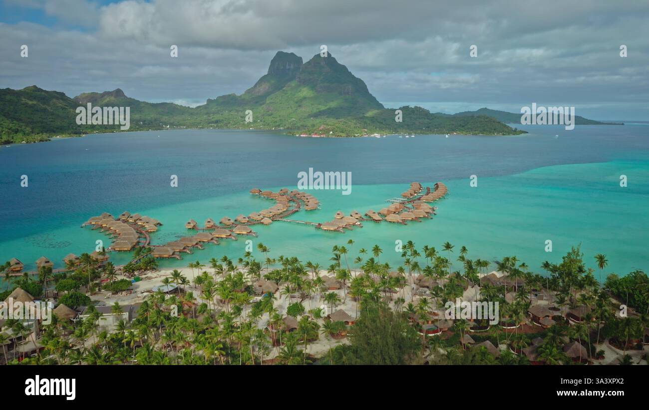 Stunning aerial view of mount Otemanu and the surrounding turquoise ...
