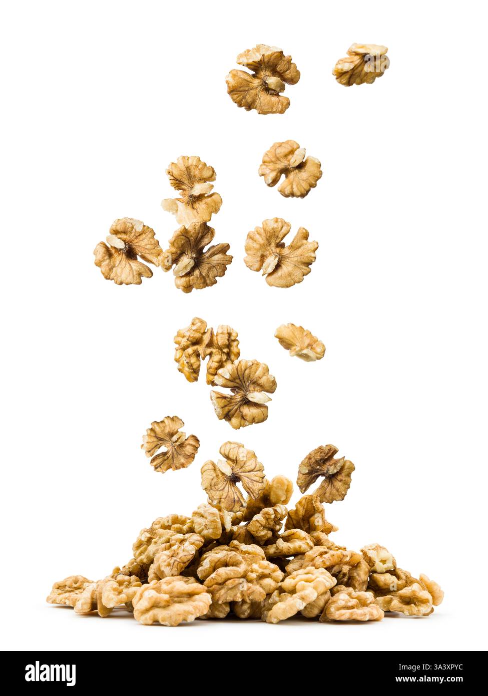 Shelled walnuts falling on a pile, isolated on white background Stock ...