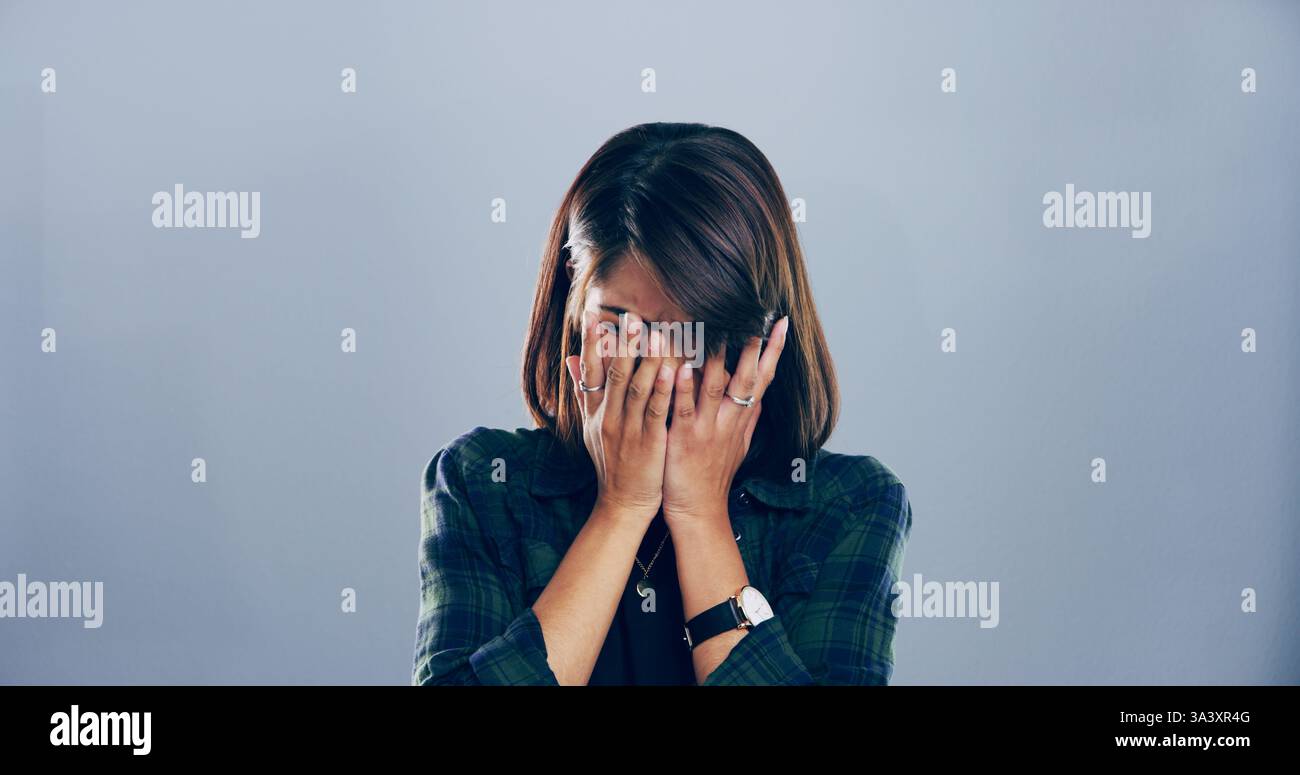 Sad, woman and crying of breakdown in studio for divorce fail, broken ...