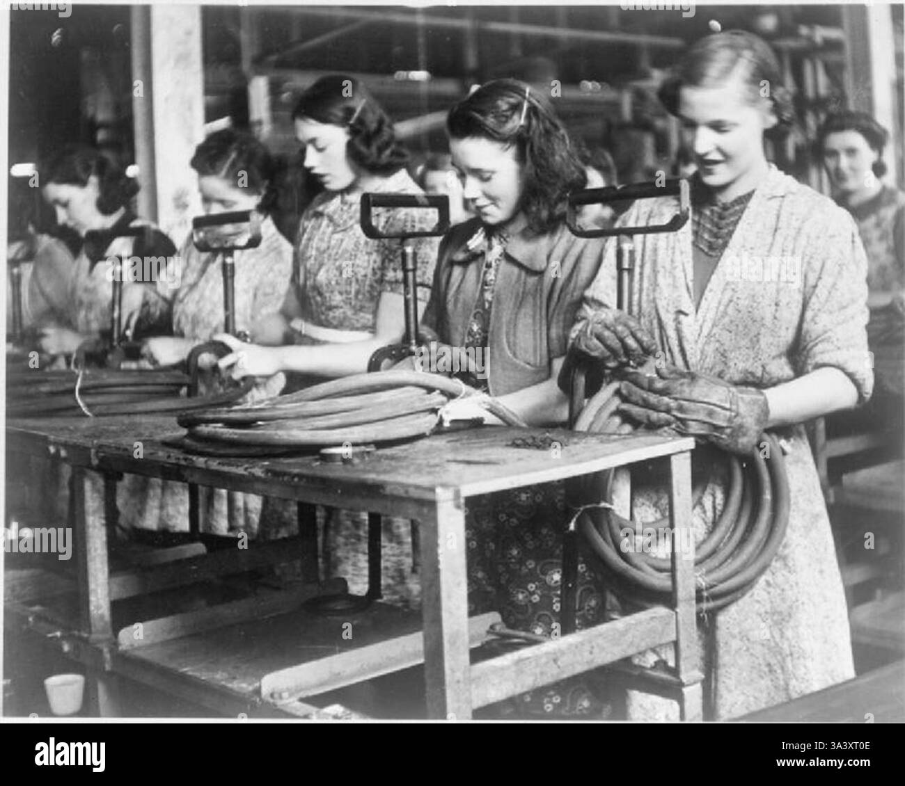WWII - women at work . Female factory workers in 1941 Stock Photo - Alamy