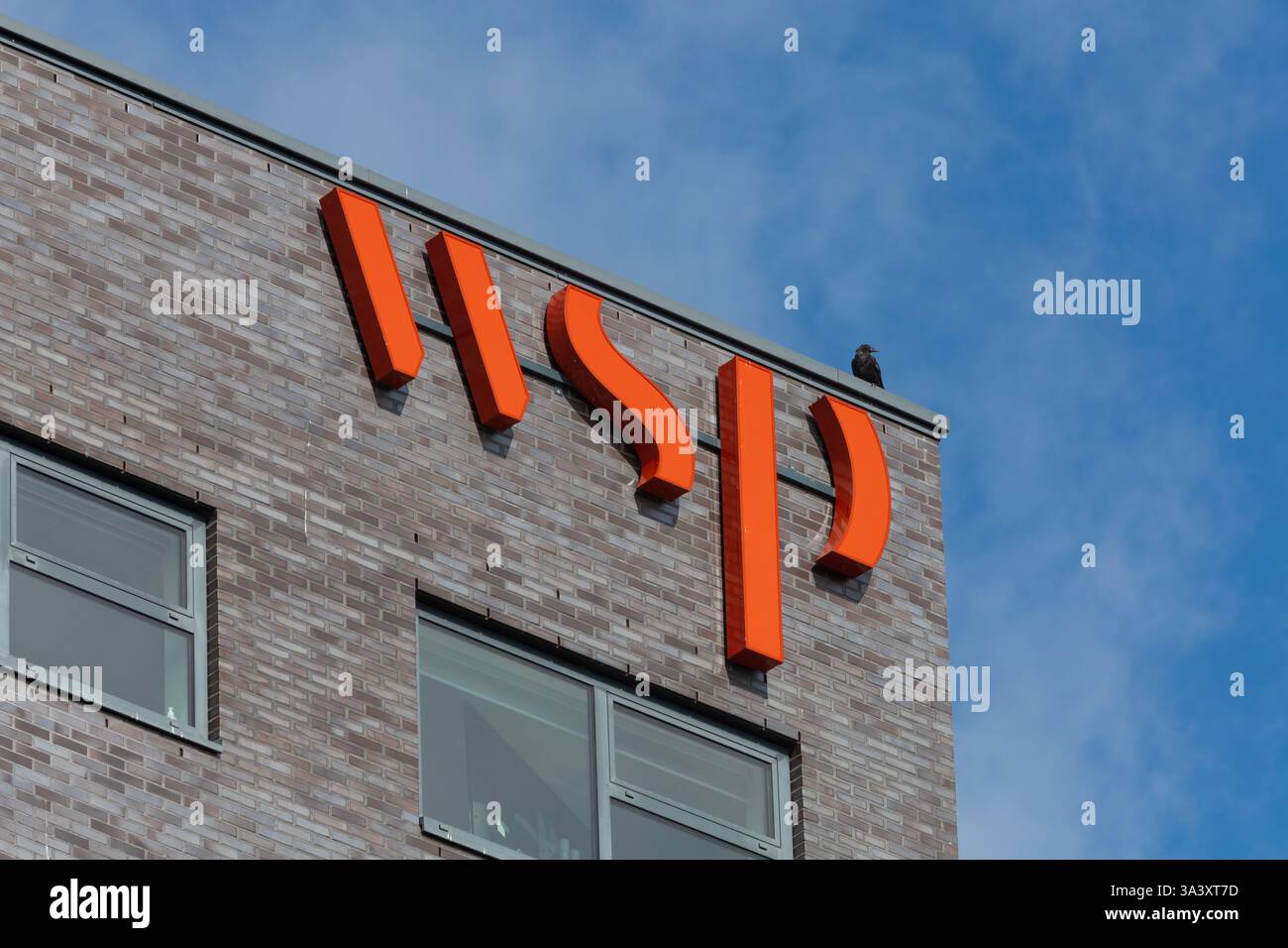 WSP logo sign on the building. WSP is a globally services firm providing strategic advisory ...