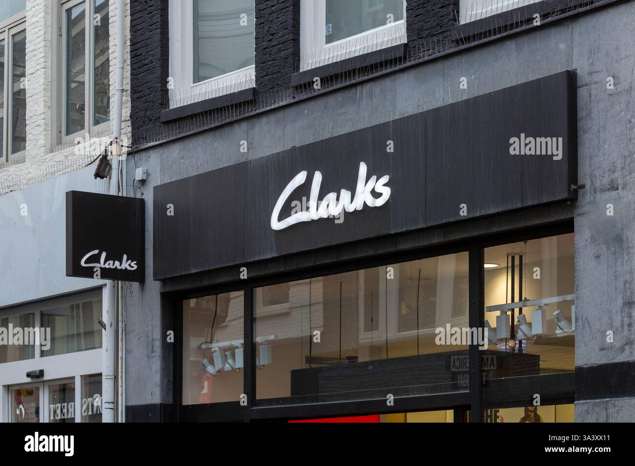 Clarks shoe store logo above the shop entrance Stock Photo - Alamy