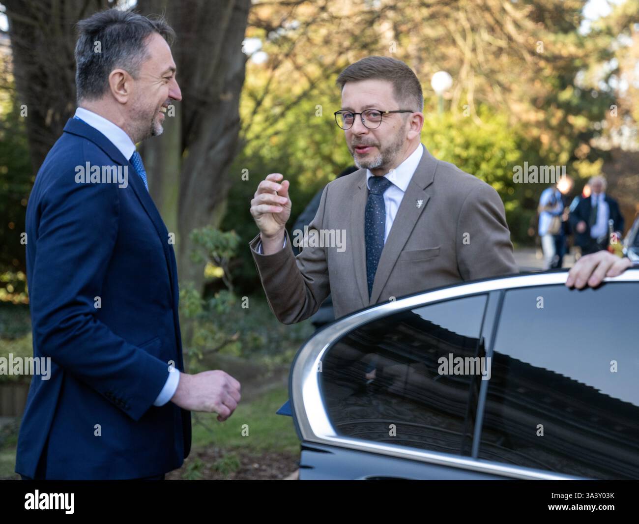 Czech Interior Minister Vit Rakusan (right) arrives to the conference ...