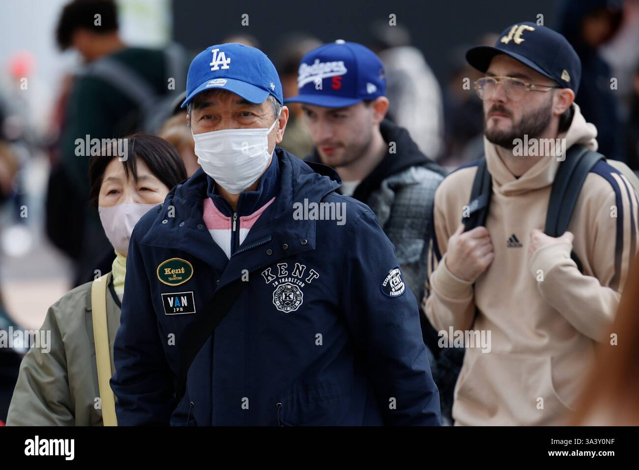 March 18, 2025, Tokyo, Japan: Baseball fans are seen at the shopping ...