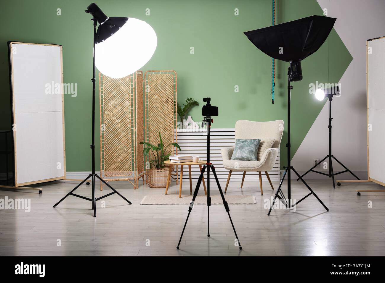 Professional photo studio equipment prepared for shooting living room ...