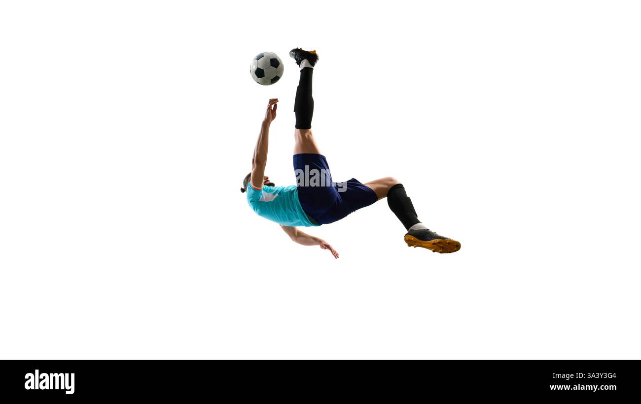 Gravity-defying football stunt with player executing flawless overhead kick, body twisting in ...