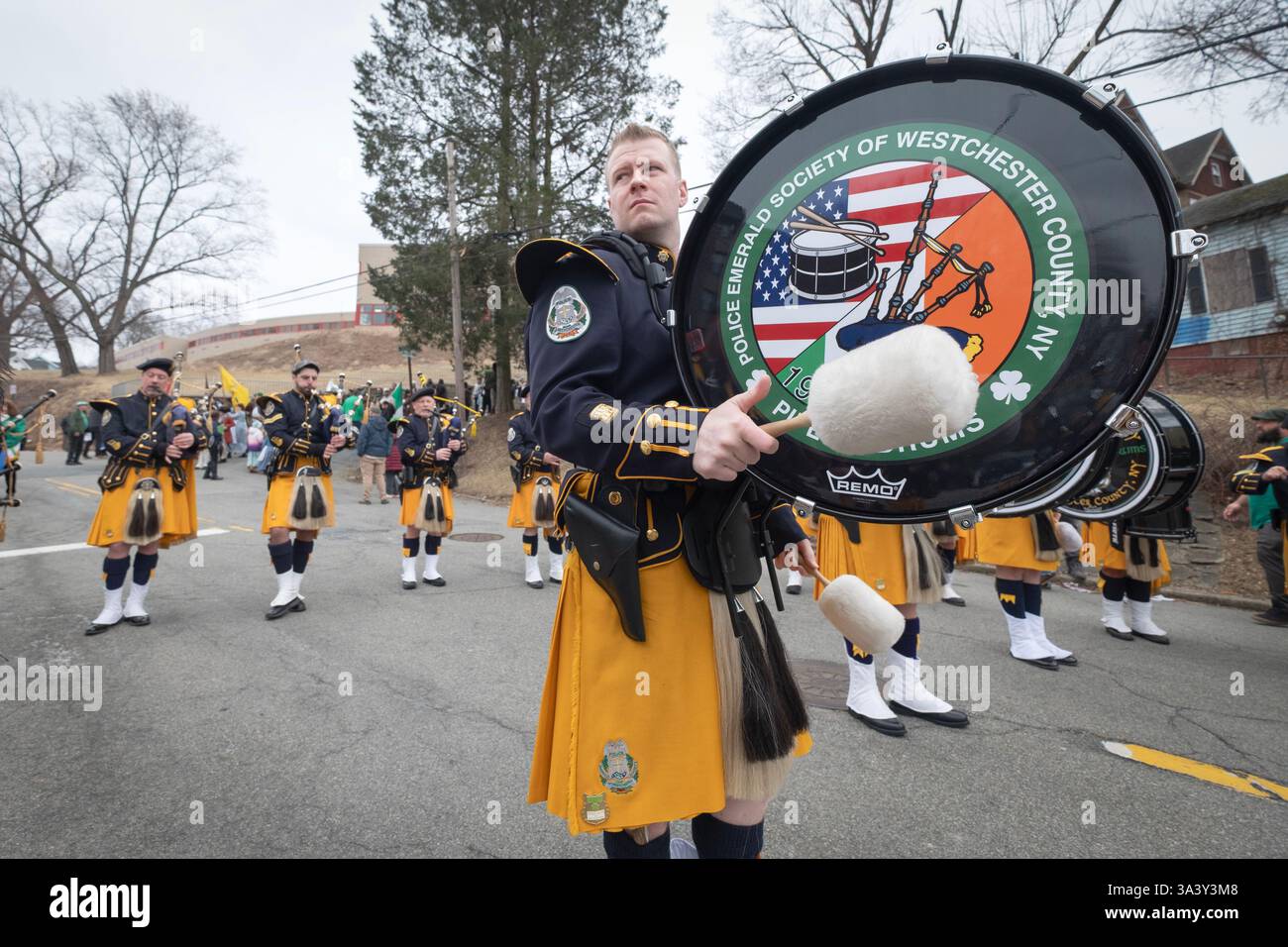 A drummer from the Police Emerald Society of Westchester County, NY ...