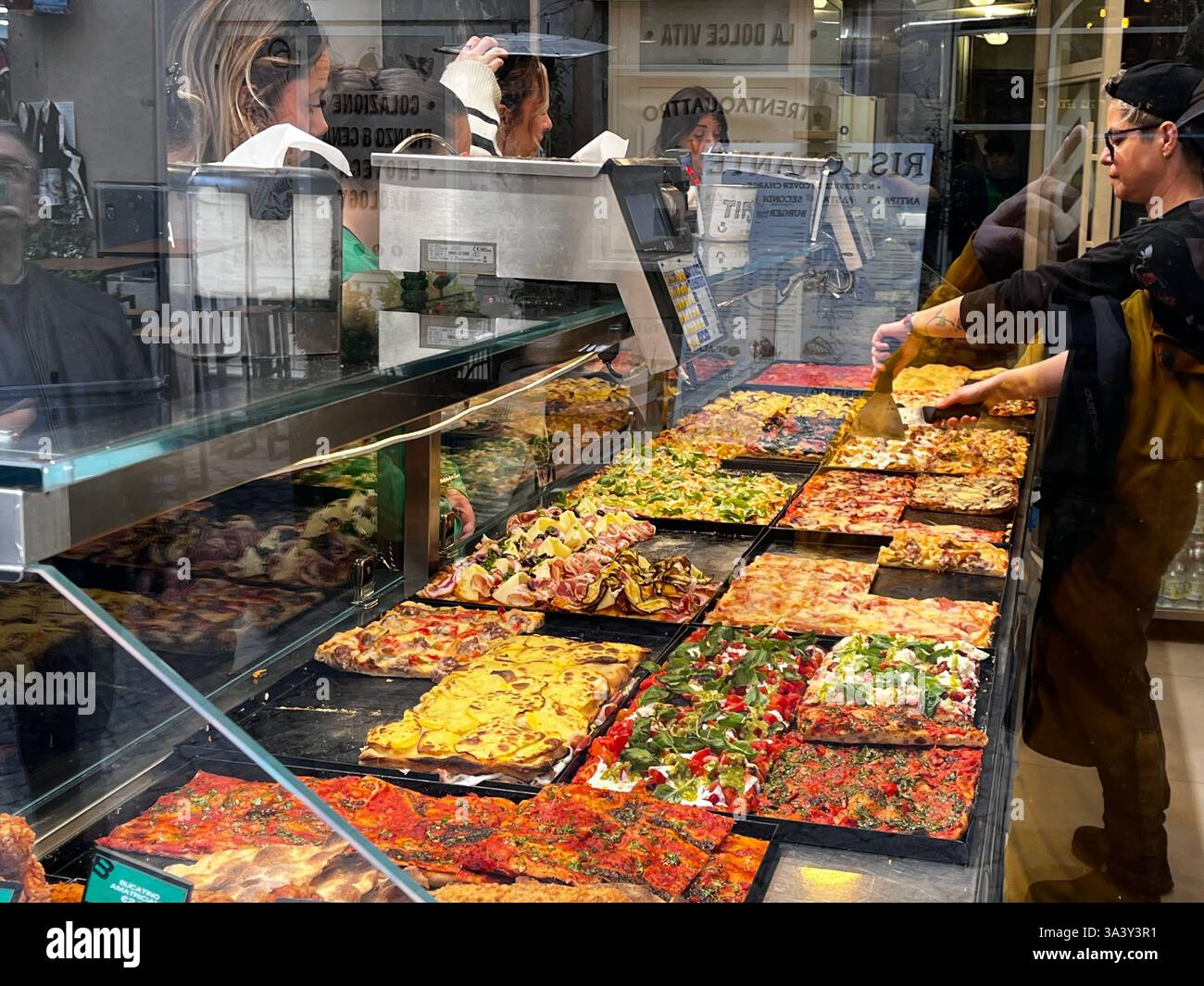Rome, Italty - March 2025 - Pizza shop, pizzeria al taglio Stock Photo ...