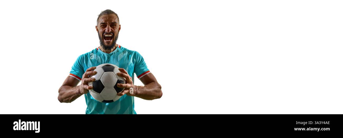 Banner. portrait of young football player, holding football looking at ...