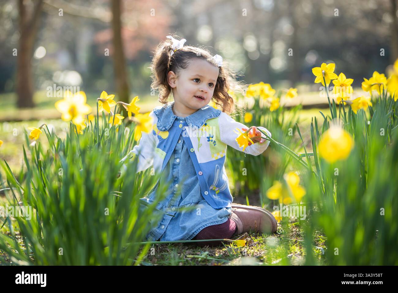 Dudley. West Midlands. 18th March, 2025. Three year old Eve enjoys a ...