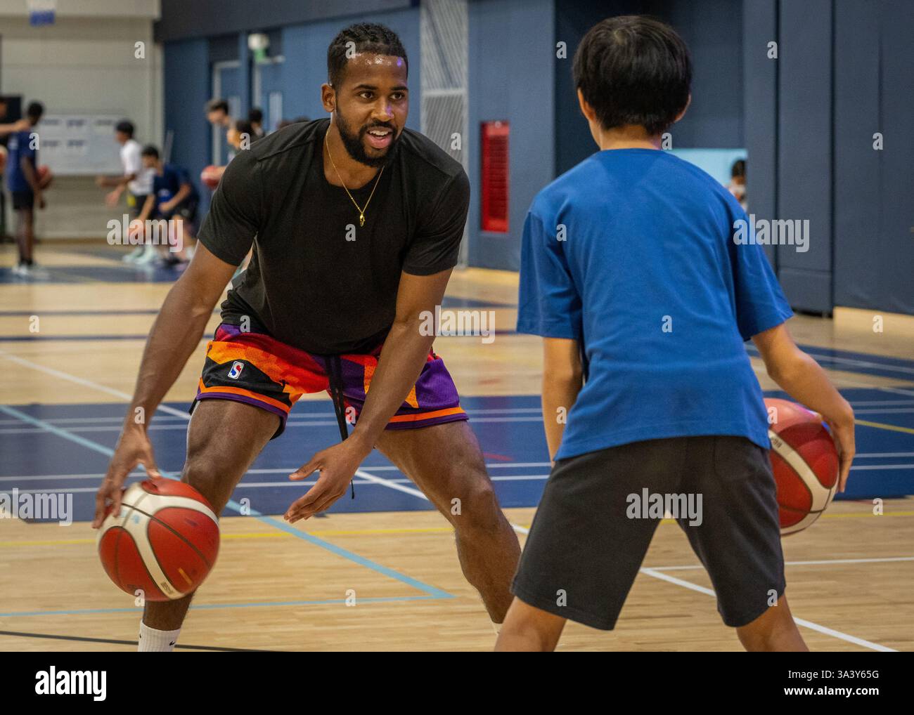 Bangkok, Thailand. 09th Mar, 2025. A basketball coach seen training a ...