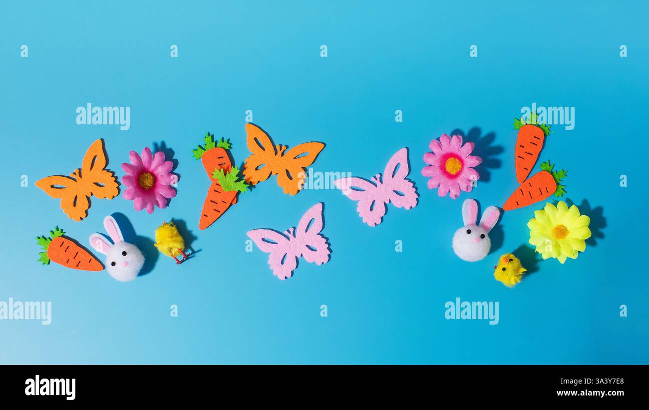 Colorful easter spring theme with butterflies, flowers and bunnies on ...
