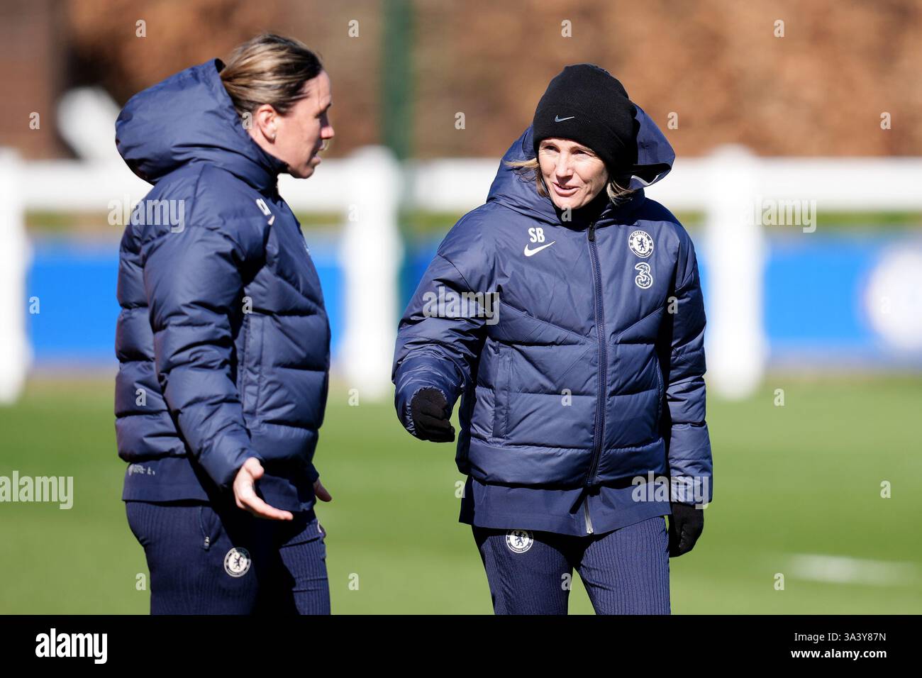 Chelsea manager Sonia Bompastor (right) and assistant manager Camille ...