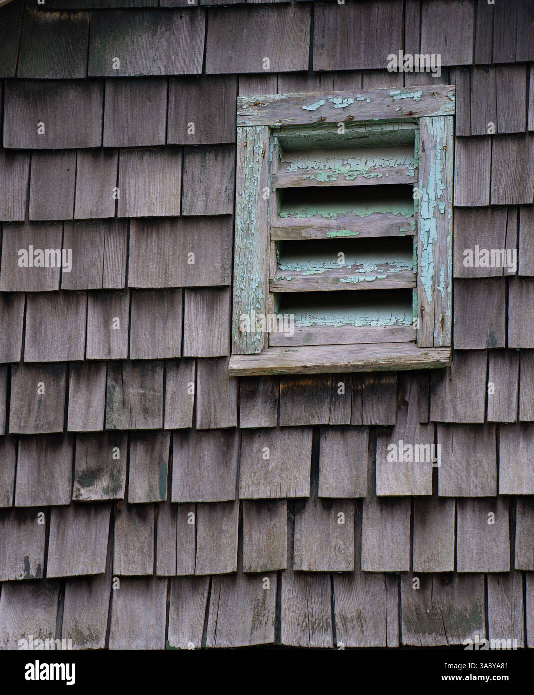 Wooden window on wood cedar shake wall of old building painted wooden ...