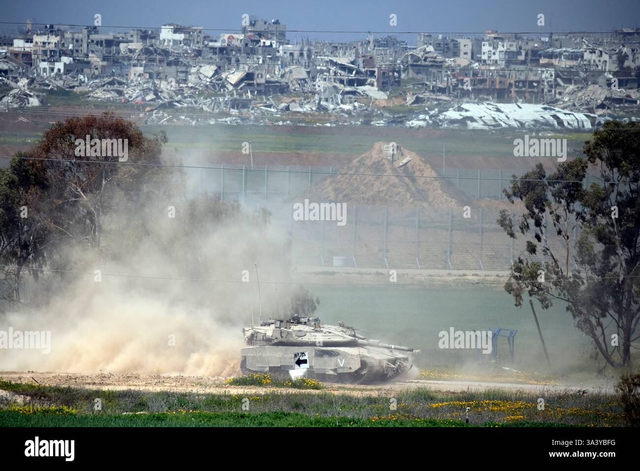 Southern Israel, Israel. 18th Mar, 2025. An Israeli army tank leaves ...