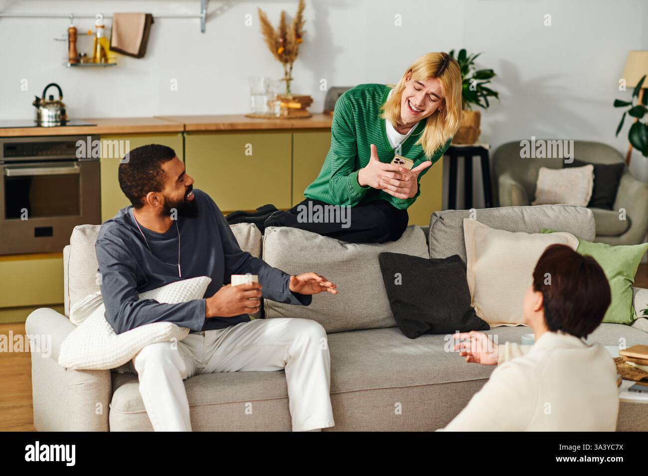 Three young men share lively conversations while enjoying a book club ...