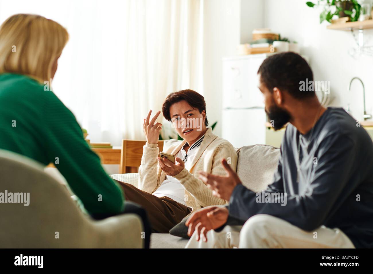 Handsome young men share lively conversations in a modern book club ...