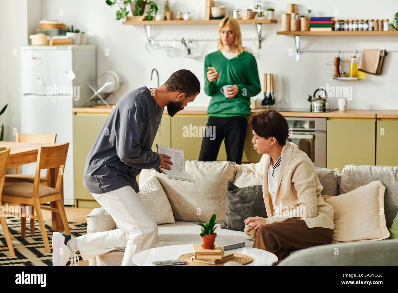 Three young men gather to share thoughts and ideas in a relaxed home ...