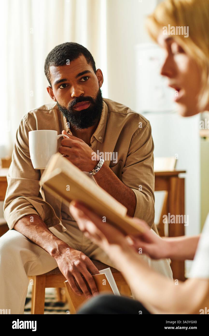 Group of diverse young men bond over ideas and stories at a casual ...
