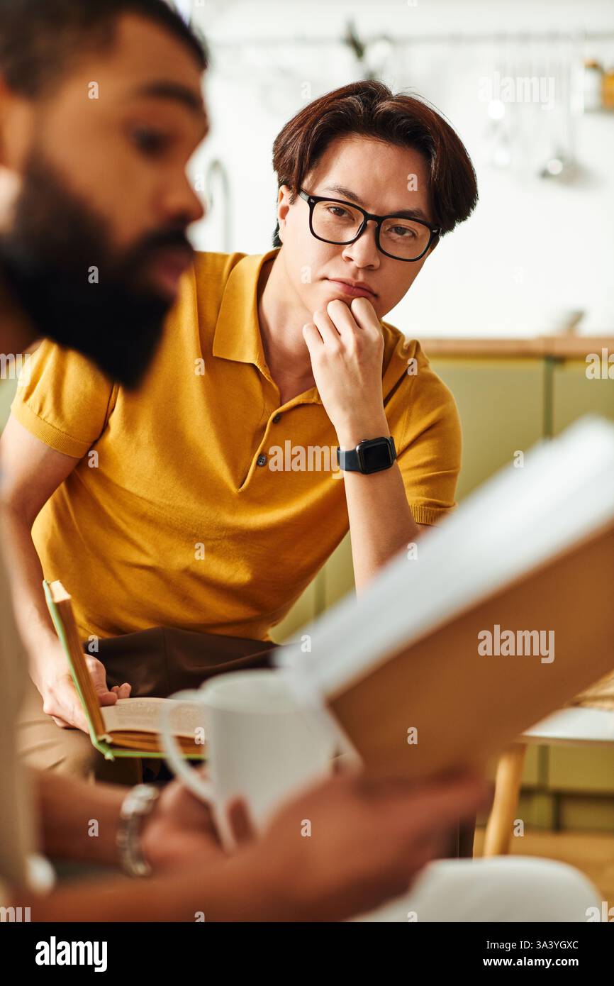 Young men participate actively in a lively discussion during their book ...