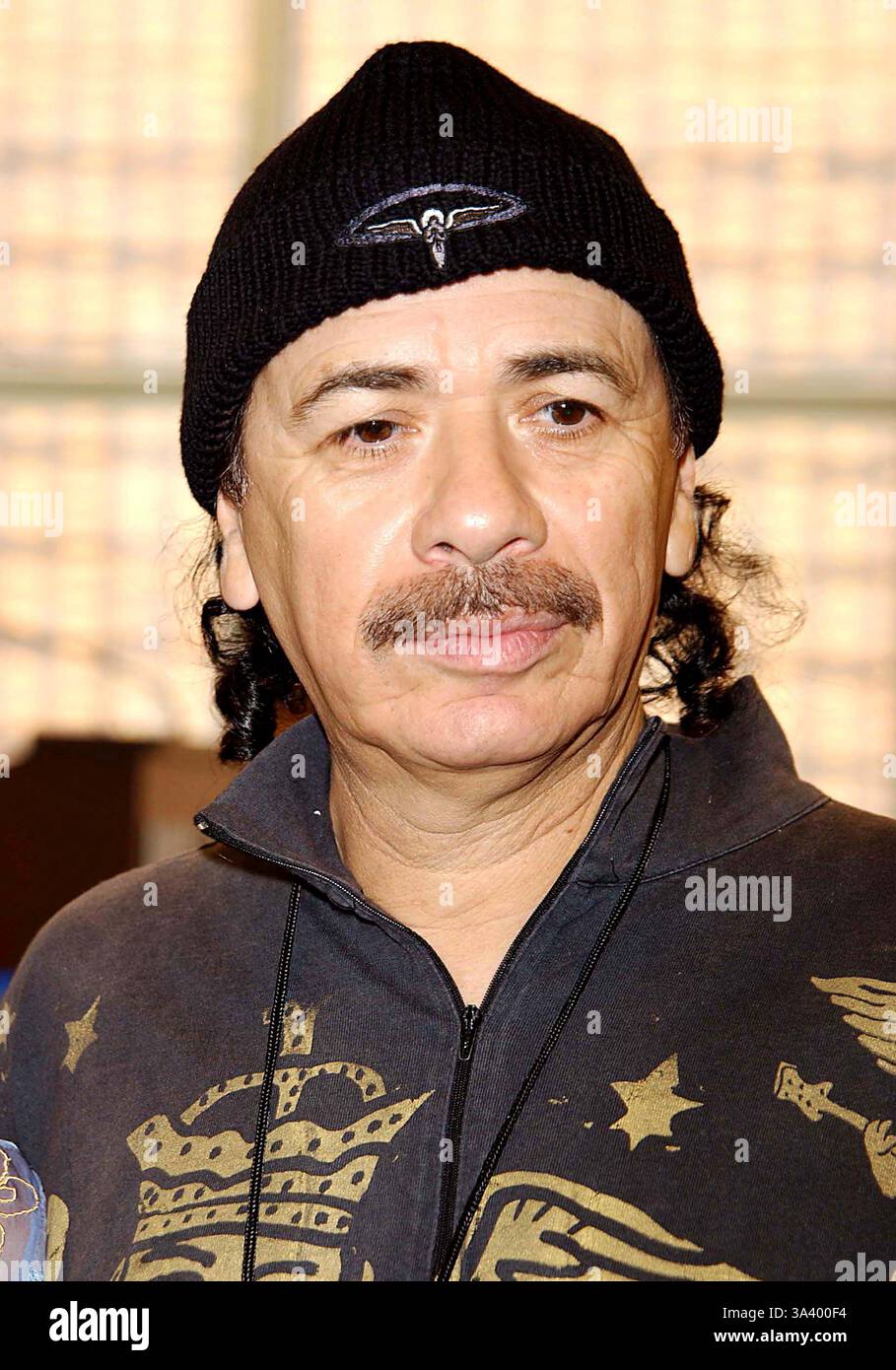 Nov. 6, 2001 - K43751AR.CARLOS SANTANA AND WIFE DEBORAH AT BARNES AND ...