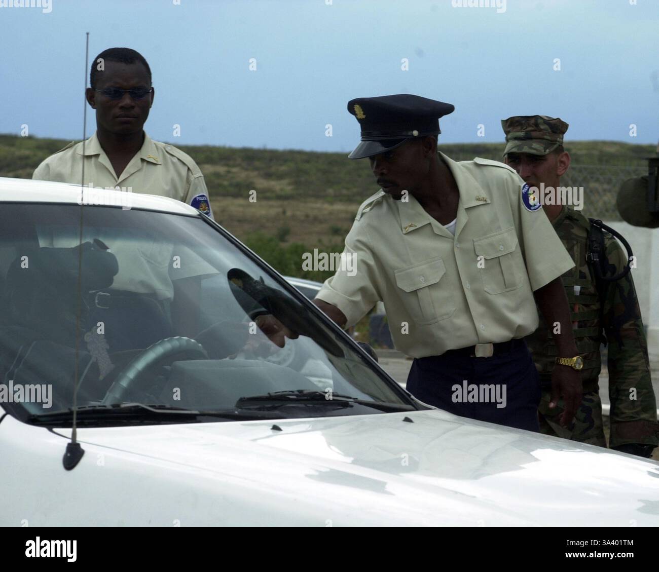 Mar 26, 2004; Port-Au-Prince, Haiti; Haitian National Police check ...