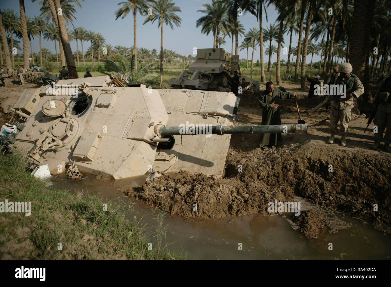 Apr 10, 2004; Fallujah, Iraq; Army Sgt. PATRICK M. REYNOLDS, 37, and an ...