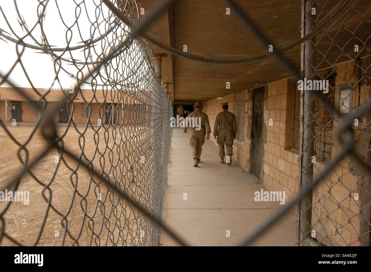 Apr 11, 2004; Camp Ar Ramadi, Iraq; Cpl. LAWRENCE T. JONES and Pfc ...