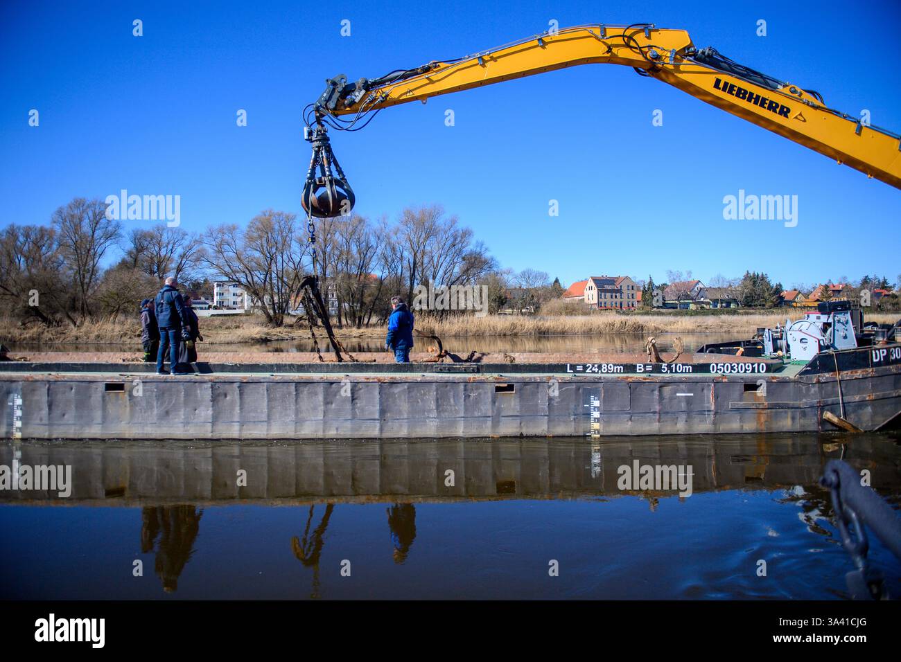 Magdeburg, Germany. 18th Mar, 2025. The dredger of the dredging vessel ...