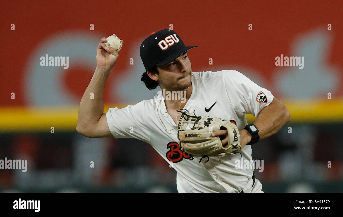 Oregon State infielder AJ Singer throws during an NCAA baseball game ...