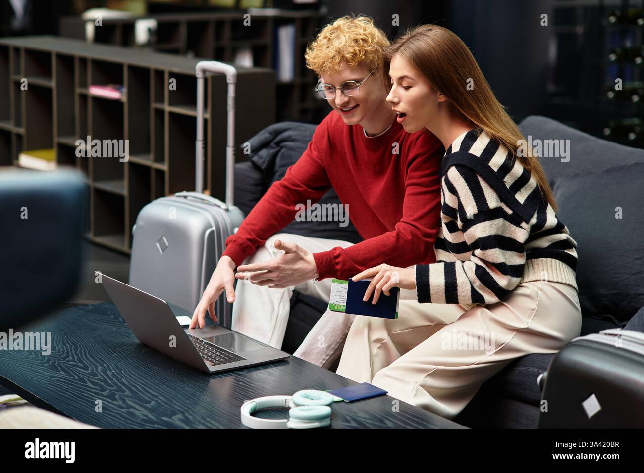 A couple shares quality time in a chic hotel lobby while exploring ...